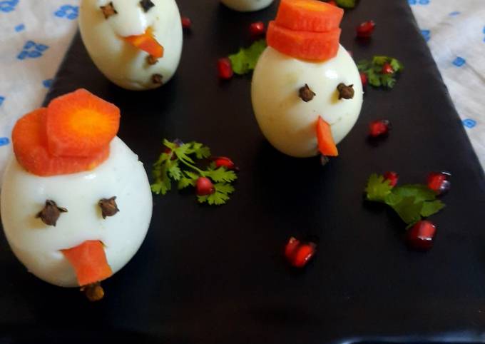 Boiled egg cut snowman Recipe by Dolly Kachhwani - Cookpad