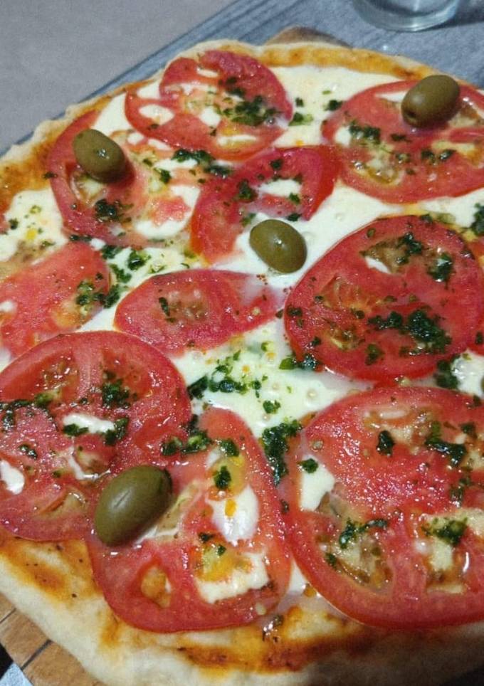 Pizzas caseras riquísimas Receta de Estefania Perez - Cookpad