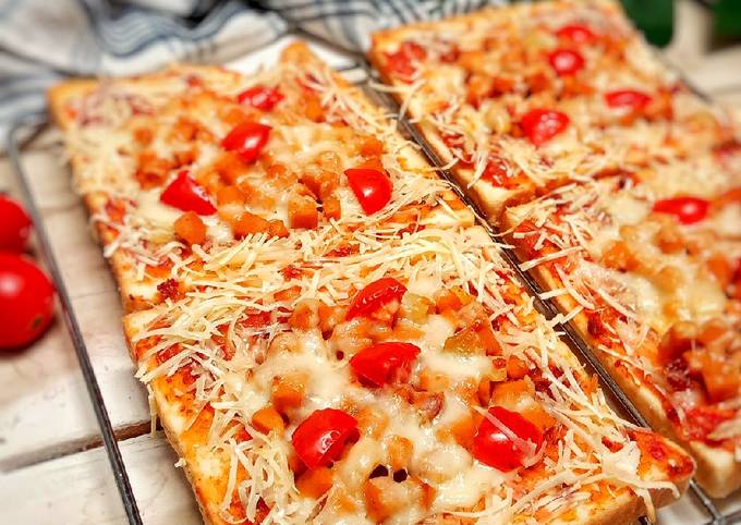 Resep Pizza Roti Tawar oleh dapurspatula - Cookpad
