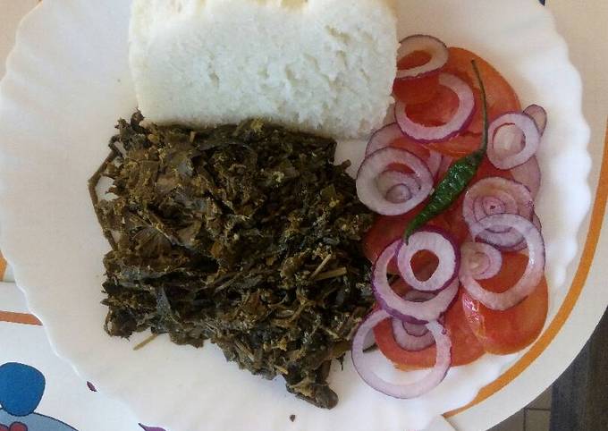 Coconut cooked managu/osuga/mnavu and ugali Recipe by Milka James - Cookpad