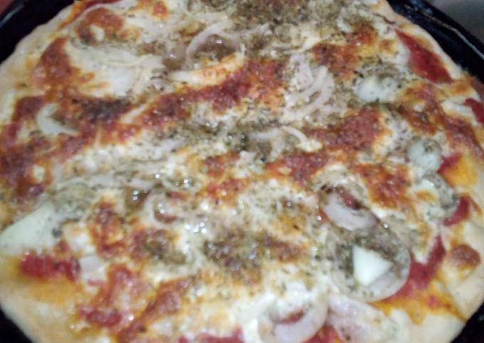 Pizza de cebolla gratinada Receta de Yanil Huertos- Cookpad