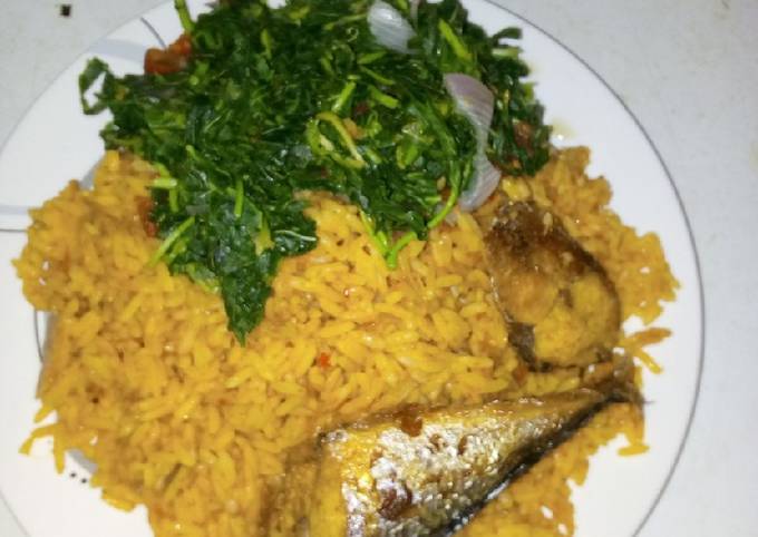 Jollof rice with fried fish and vegetable Recipe by Esther's Menu ABM79 ...