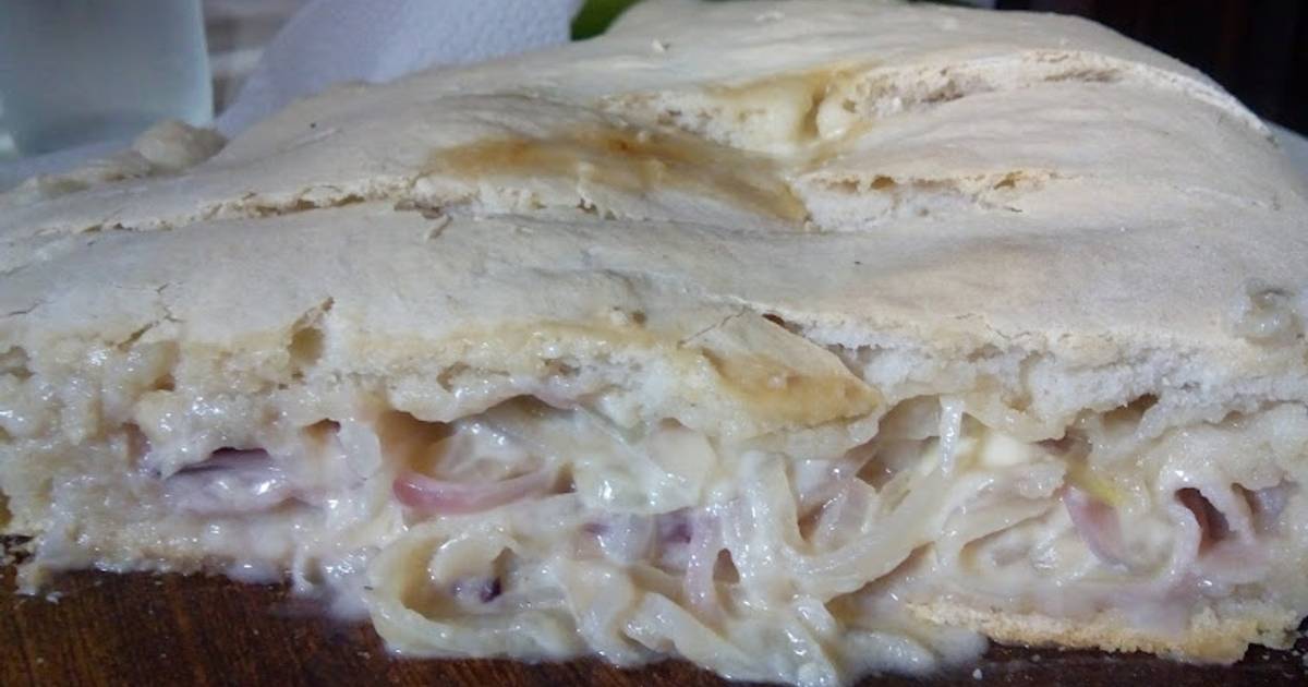 Calzón de cebolla, jamón y queso Receta de Natu NM- Cookpad