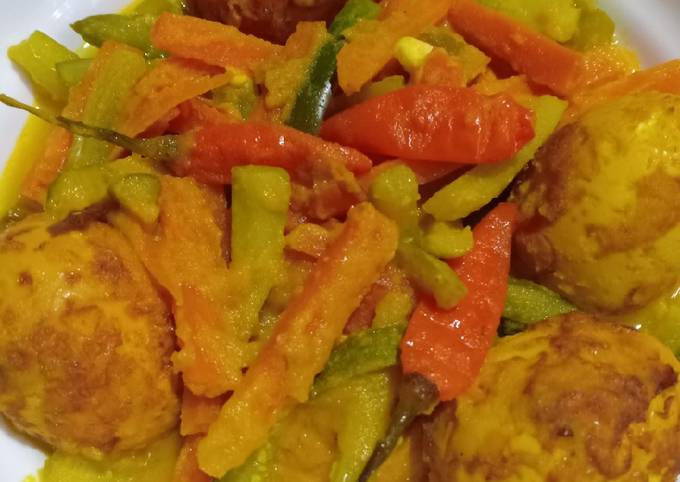 Resep Telur Acar Kuning oleh sheilla maria regar - Cookpad