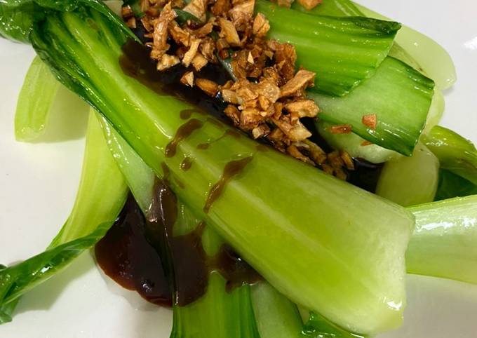 Stir-fry Bok Choy with crispy garlic and oyster sauce Recipe by Jeerapa ...
