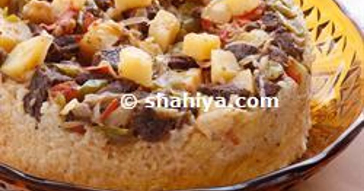 Mechwi Jader Upside Down Rice And Vegetable Cake Recipe by Dorar el Bahrain