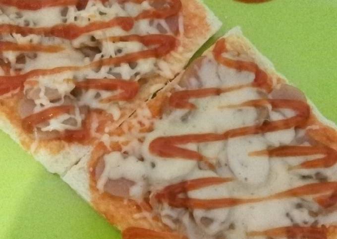 Resep Pizza roti tawar oleh BundaAini - Cookpad