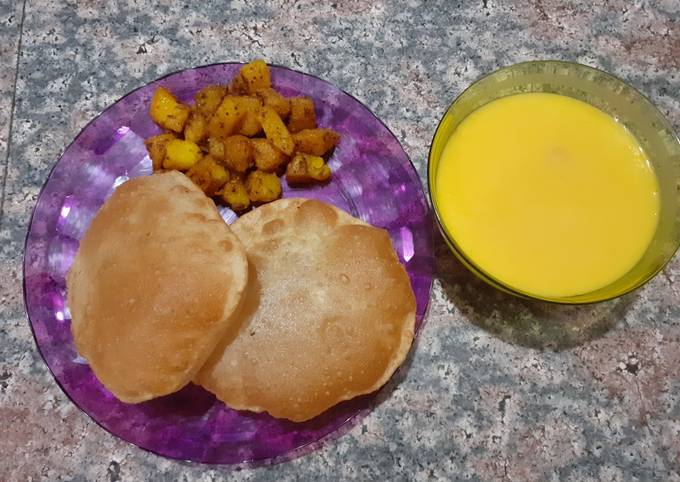 Aamras puri with quick spicy aalu masala Recipe by Jagruti - Cookpad