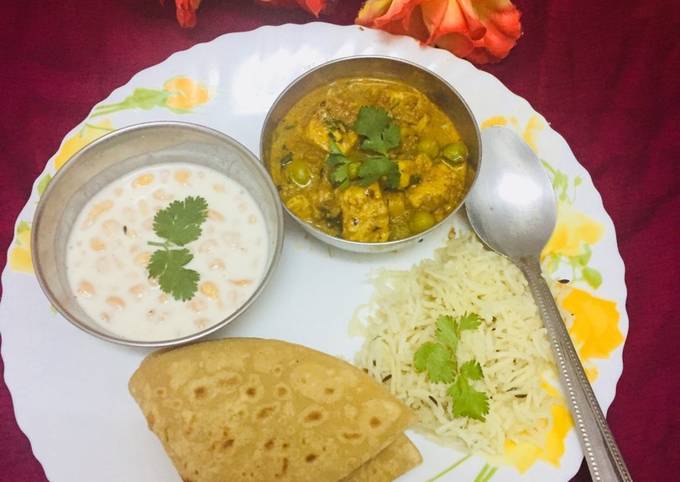 Mater paneer bundi raita jeera rice paratha(In proper lunch thali ...