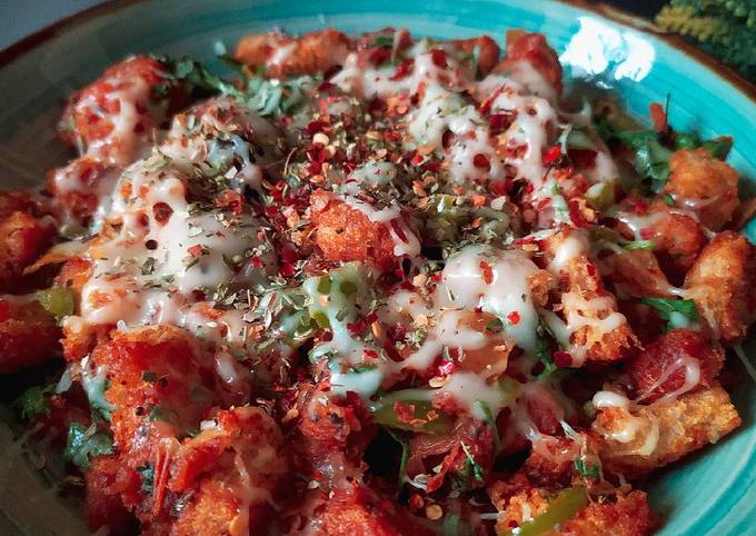 Cheesy Schezwan Masala Bread Recipe by _pjs kitchen_ - Cookpad