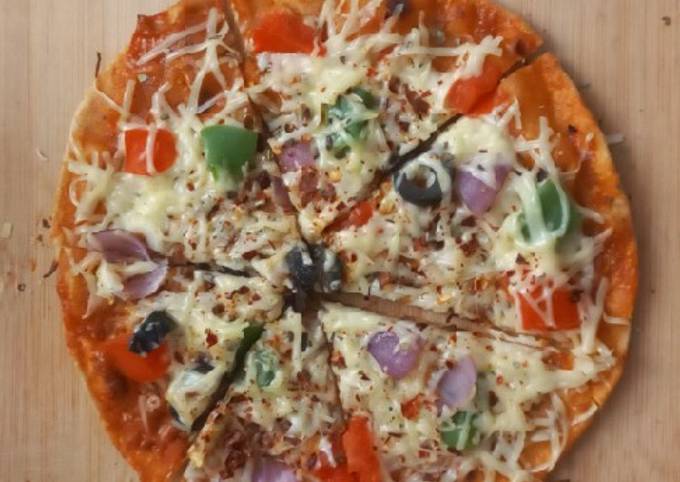 Roti Crust Pizza Recipe by Chef Sejal - Cookpad
