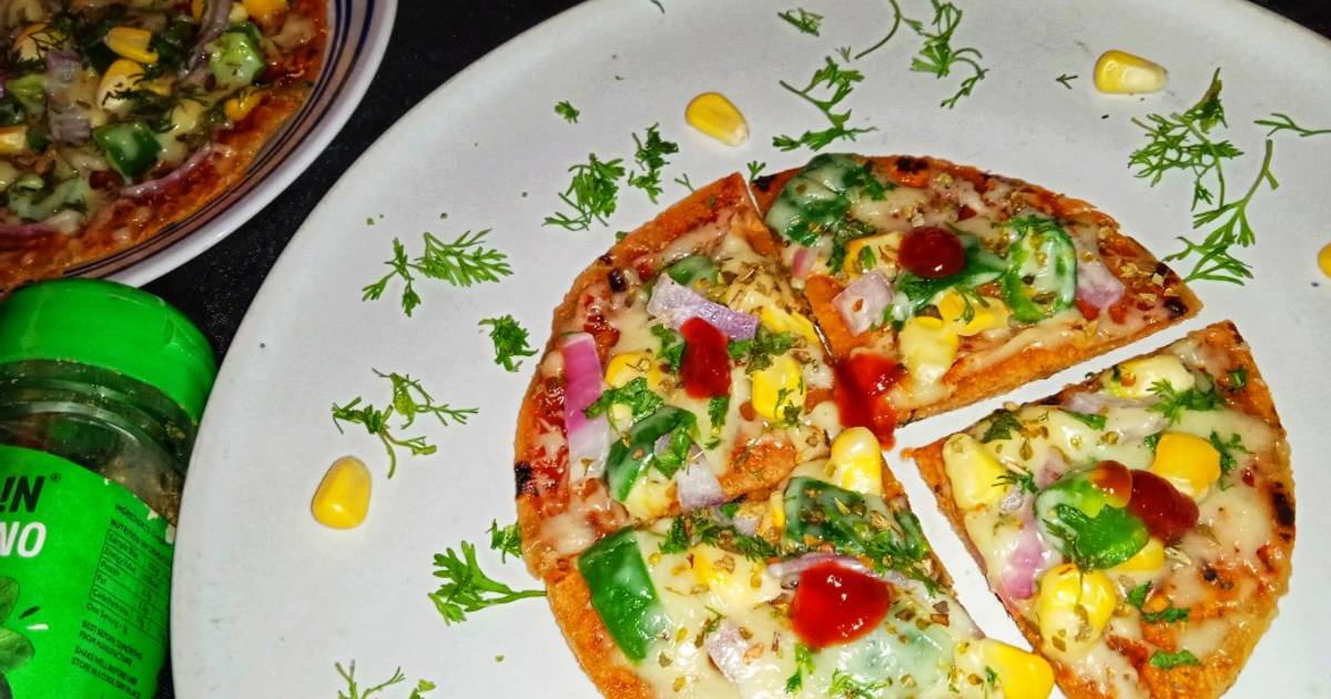 Chapati Pizza Recipe by Vedangi Kokate - Cookpad