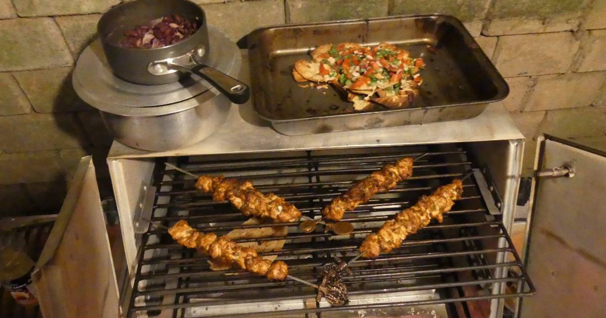 Chicken satay kebabs and home made pili pili cheesy chapati nachos in ...
