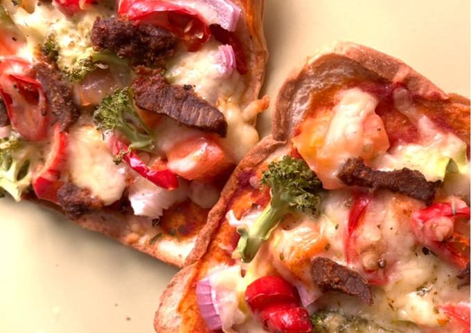 Resipi Pizza Roti Simple oleh Hafsah - Cookpad
