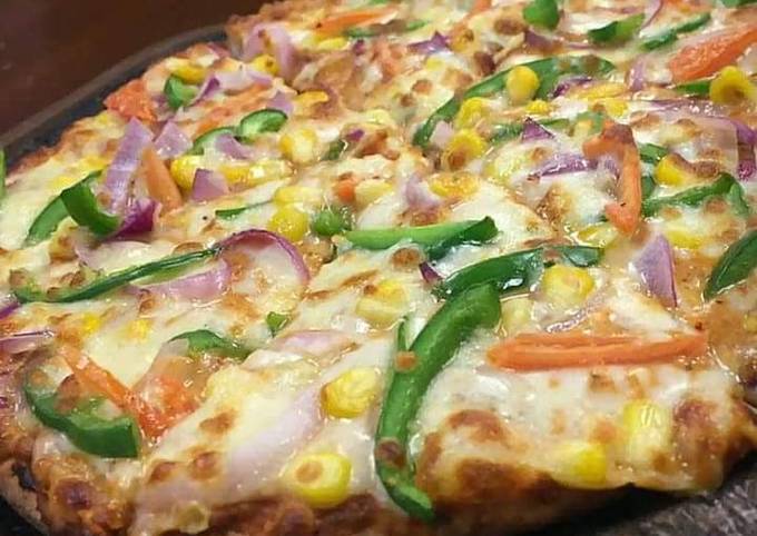 Corn capsicum pizza Recipe by Bhavika Dua - Cookpad