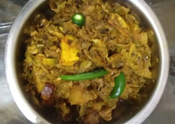 Cabbage with fish head Recipe by shefali Bhattacharya - Cookpad