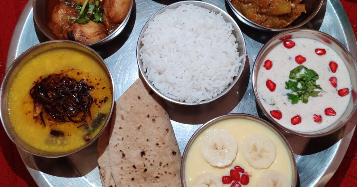 North Indian Thali For Lunch..Dal, Aloo Dum, Kaddu Sabzi, Rice, Roti ...