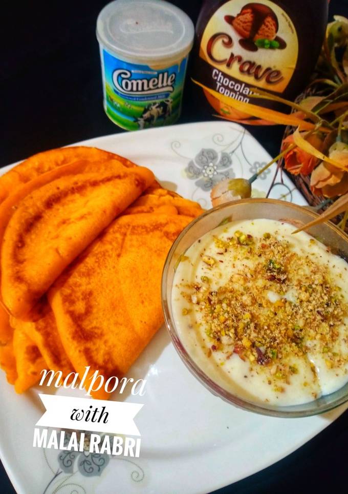 Malpora with Malai rabri Recipe by Umme Ali - Cookpad