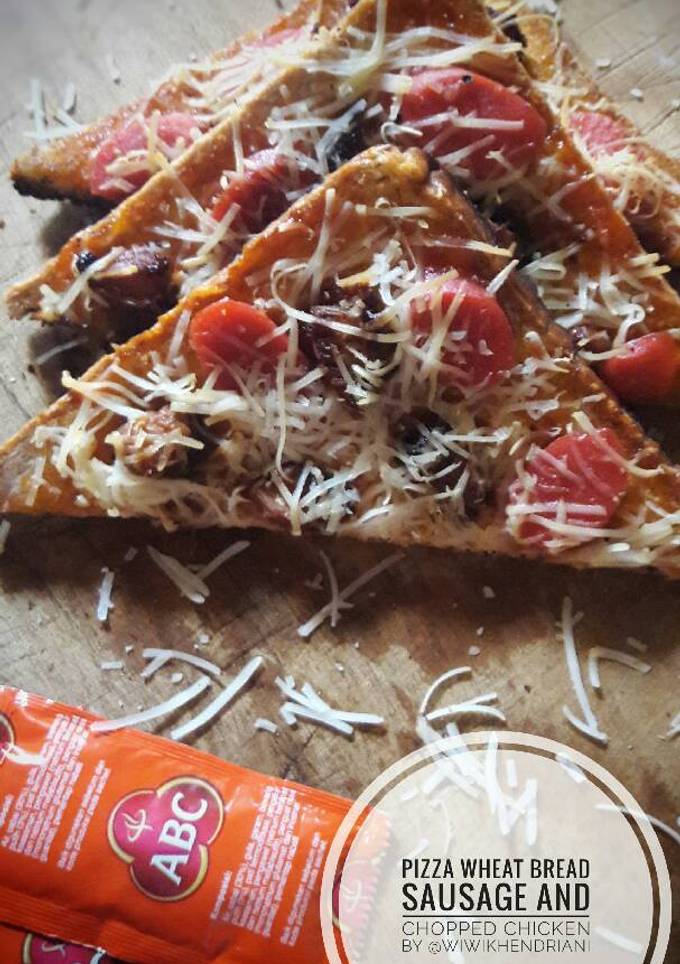 Resep Pizza Roti Gandum toping Sosis & Ayam oleh wiwik hendRiani - Cookpad