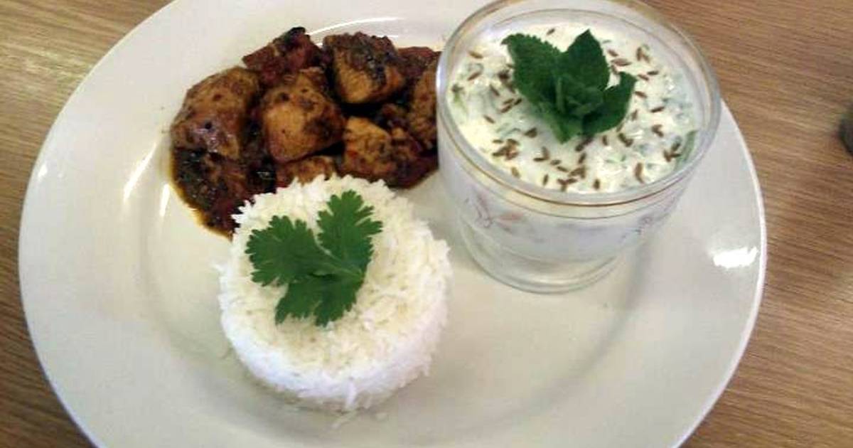 Achar (eastern pickle) Chicken curry served with rice and a mint and ...