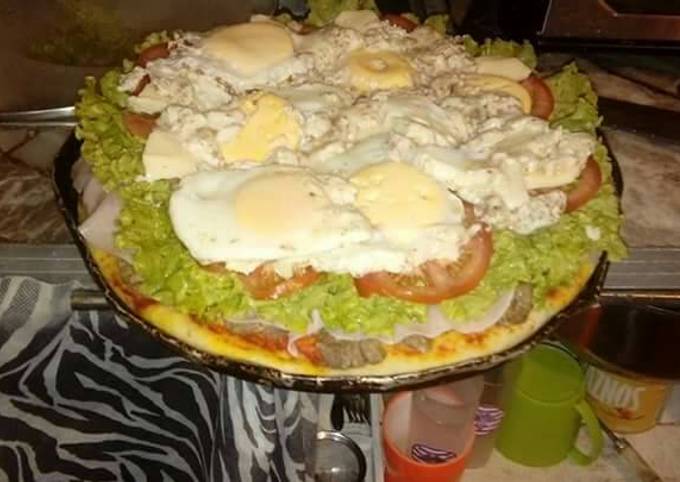 Pizza especial Receta de Elaborados Flor Duarte- Cookpad