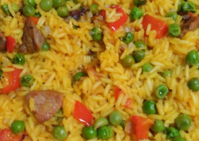 Arroz con guisantes y cerdo Receta de Chari Crzo- Cookpad