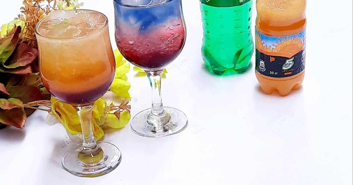 Sunrise and layered blue paradise mocktail Recipe by Maryam Harande ...