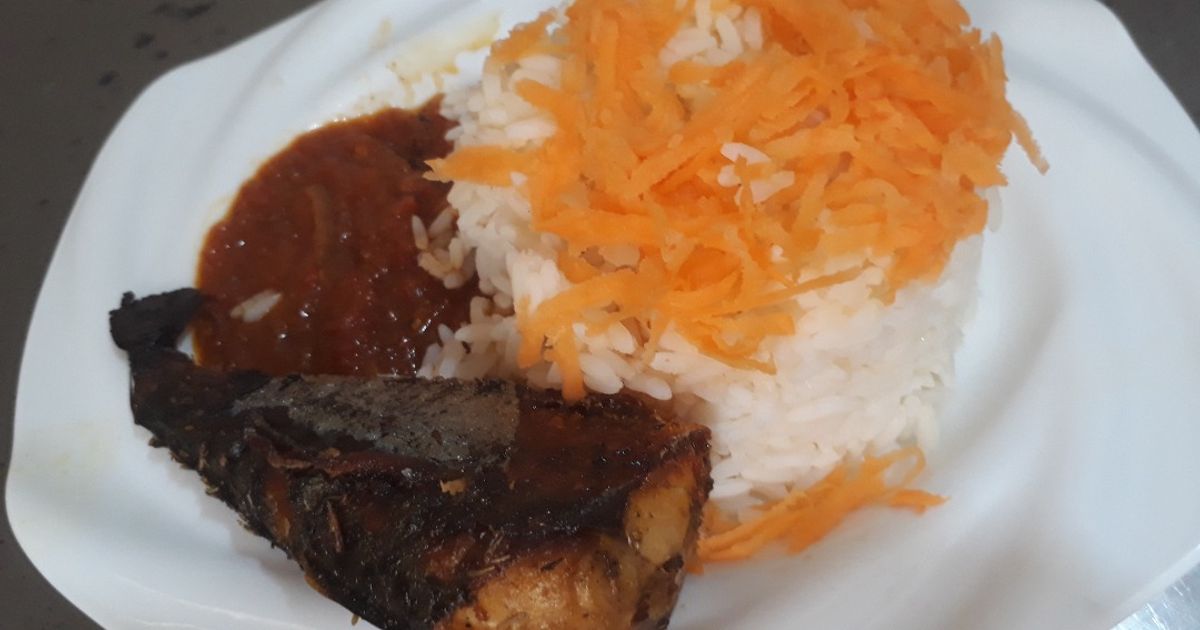 Boiled Rice With Sauce And Fried Titus Fish Recipe by Mrs ola - Cookpad