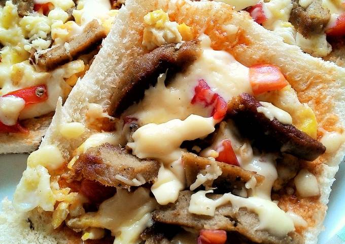 Resep Pizza roti oleh Dwi yuliarti - Cookpad