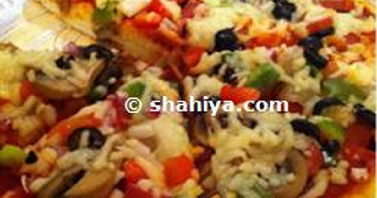 طريقة عمل طريقة عمل أطيب بيتزا محضرة في البيت على اصولها بطريقة سهلة ...