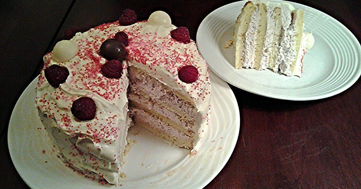 White Butter Cake Layered With Raspberry Cream With A White Chocolate ...
