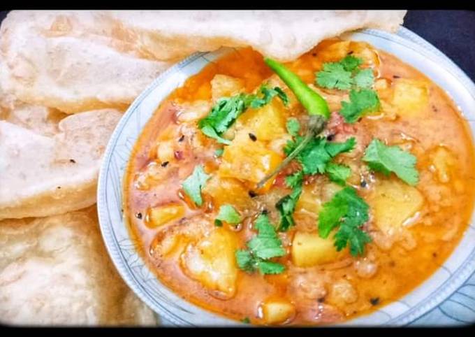 Puri & Allo ki tarkari! Recipe by Sana Owais - Cookpad
