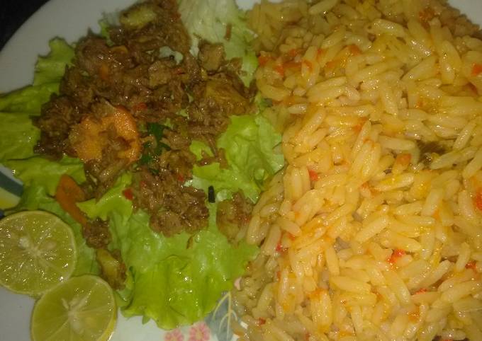 Jallof rice with salad Recipe by @Rahma Barde - Cookpad