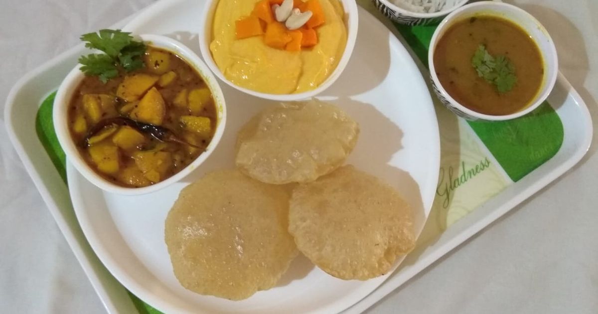 Gujarati Lunch (Rasadar Aloo Sabji, Amrakhand, Puri, Dal, Rice) Recipe ...