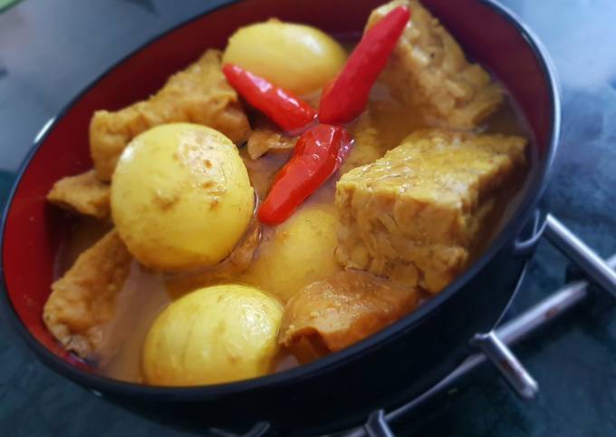 Resep Tempe tahu telor bumbu kuning oleh Windy Utami BP - Cookpad
