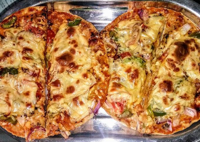 Roti pizza Recipe by Deepali Saurabh Bansal - Cookpad