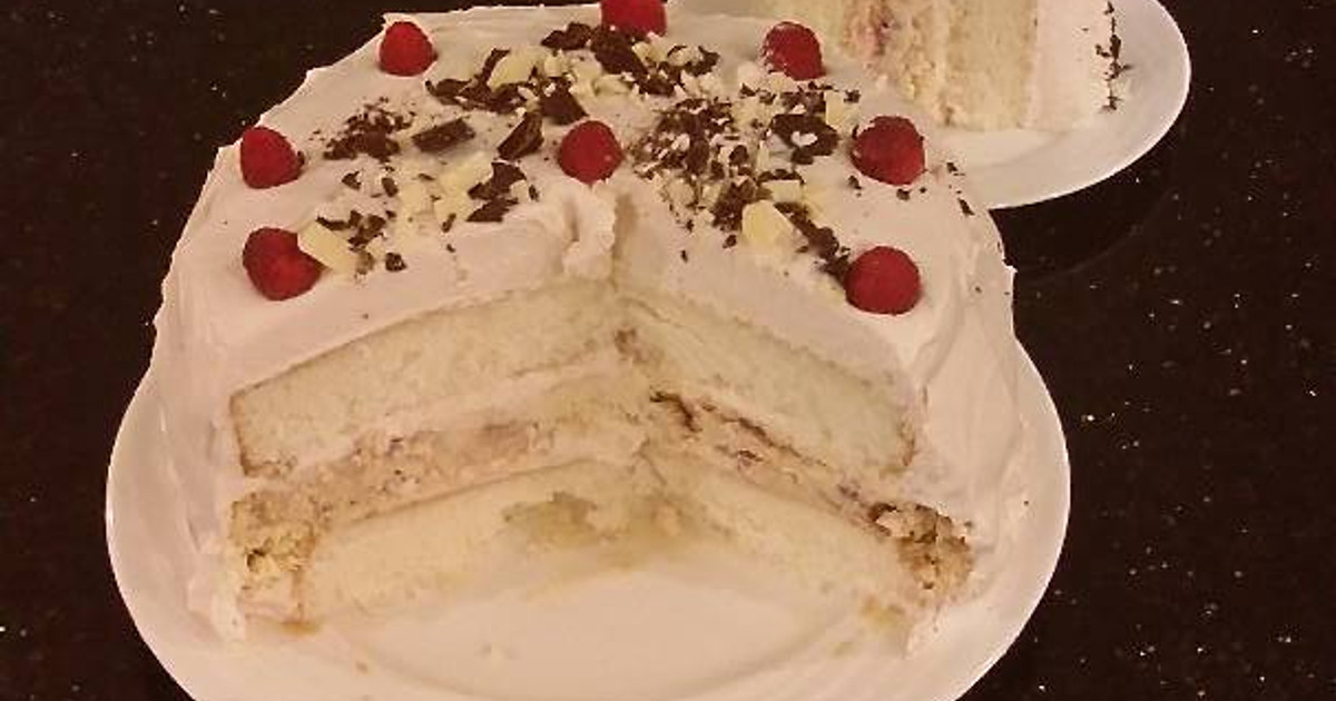 White Layer Cake With A Raspberry Swirl Cheesecake Center Layer And A ...