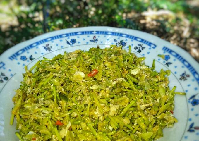 Resep Tumis bunga pepaya oleh Erfani Yanti - Cookpad