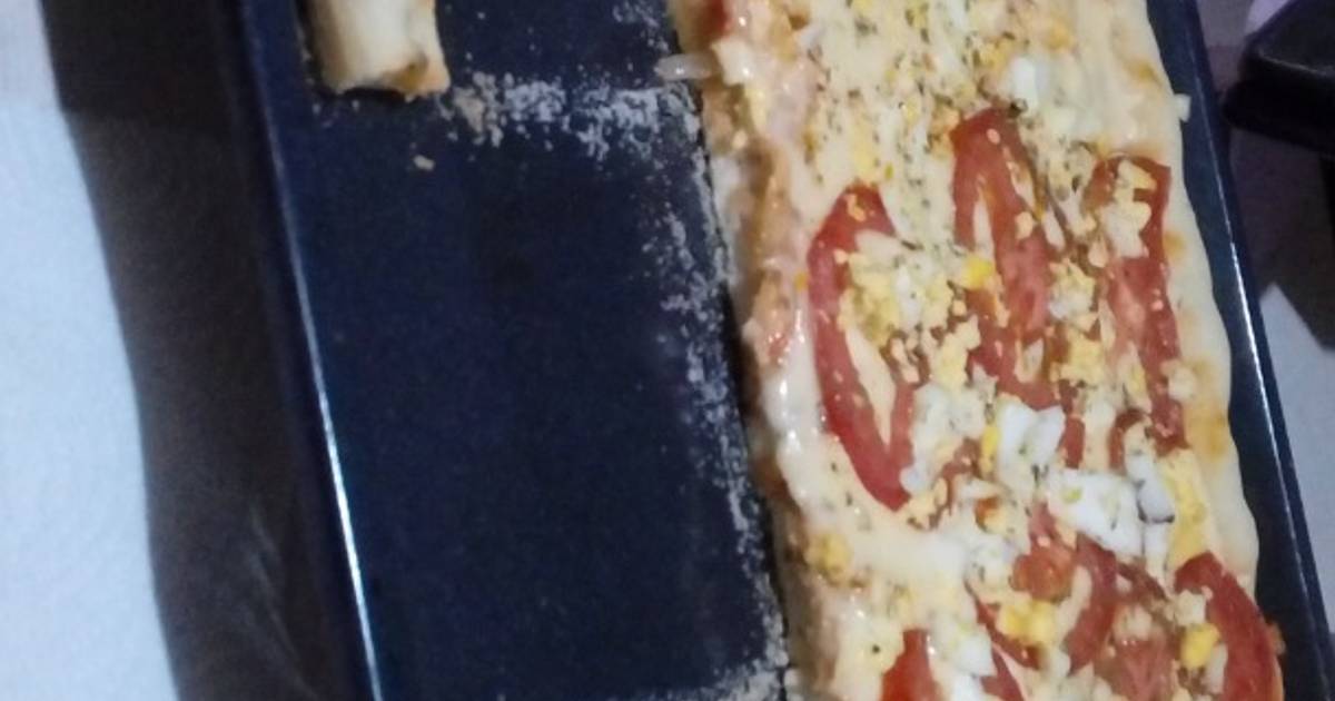 Pizza de queso, tomate y huevo Receta de Natacha Romero- Cookpad