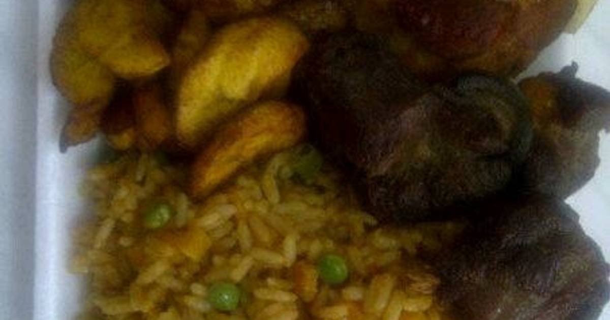 Jolly rice with fried goat meat and plantain Recipe by kitchengoddess ...