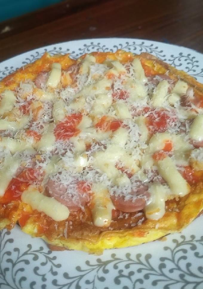 Resep Pizza Roti Telor Teflon Sederhana oleh Dapuraldifa - Cookpad