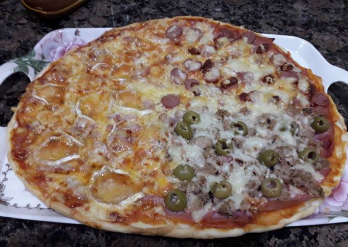 Pizza capricho Receta de Elisa- Cookpad