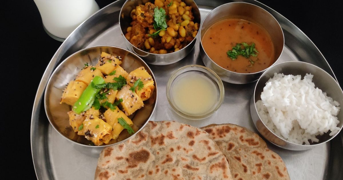 Gujarati Thali For Lunch Or Dinner (Puran Poli Khandvi,Dana Muthiya ...