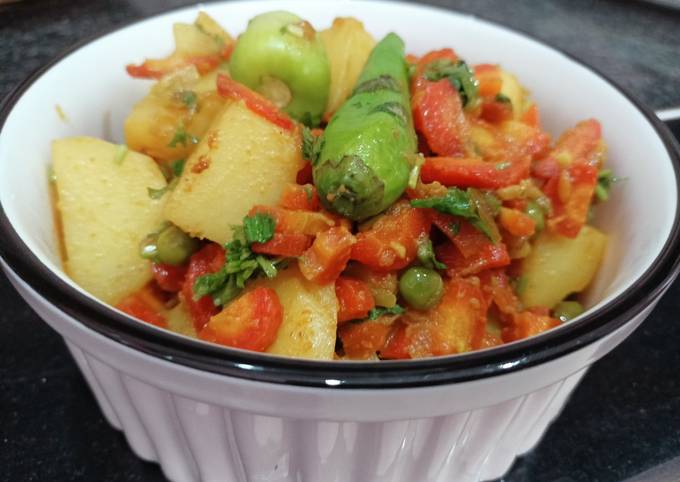 Aloo matar gajar mix veggies Recipe by Anam Azhar - Cookpad