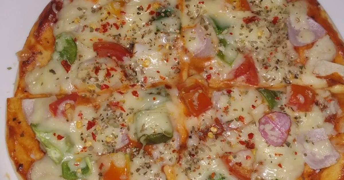 RotiPizza Recipe by Bibhasini Patra - Cookpad