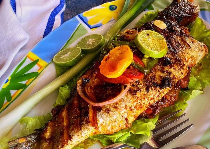 Tomato herbs shrimp stuffed grilled bhetki with lemon butter sauce ...