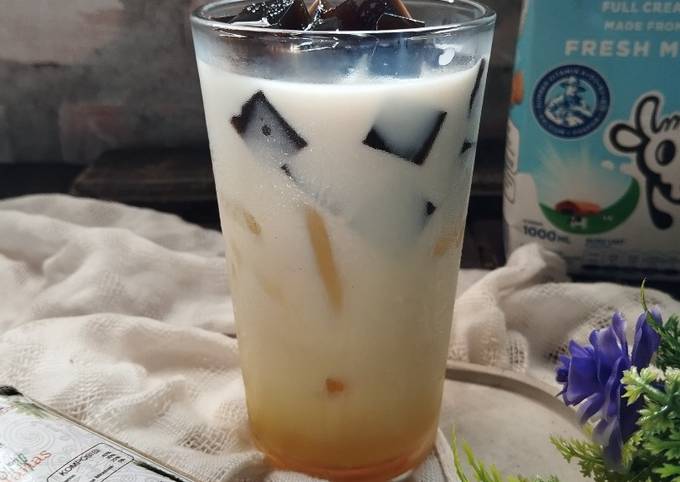 Resep Es Susu Cincau Sirup Nanas oleh Widjie Astuti - Cookpad