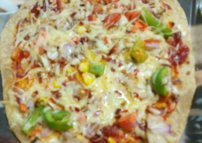 Roti pizza Recipe by Sanchita Das - Cookpad