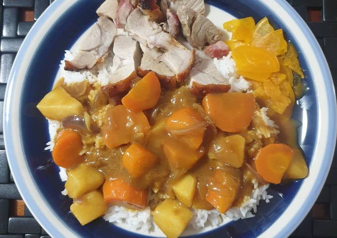 Japanese curry rice with roast pork and pickle radish on rice Recipe by ...
