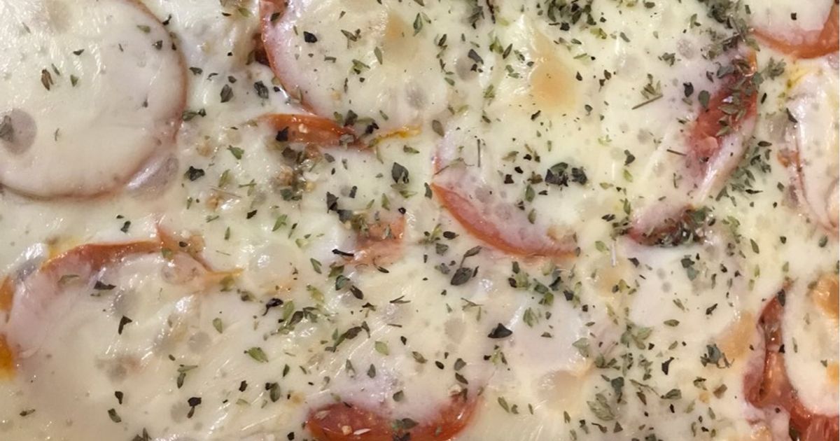 Pizza Napolitana Con Tomates Y Ajo Receta de Carolina Apecetche- Cookpad